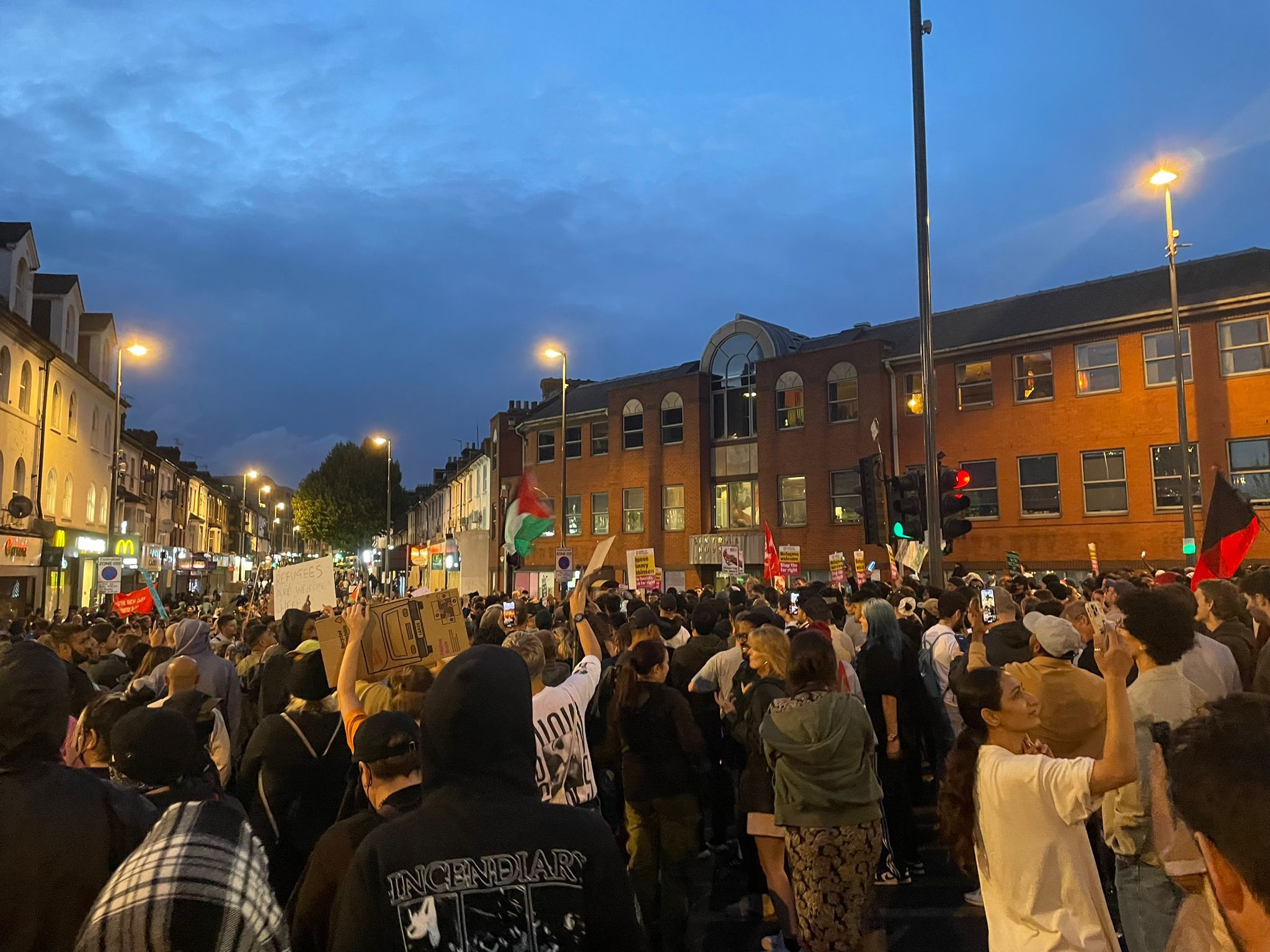 Thousands gather peacefully in show of unity against far-right in ...